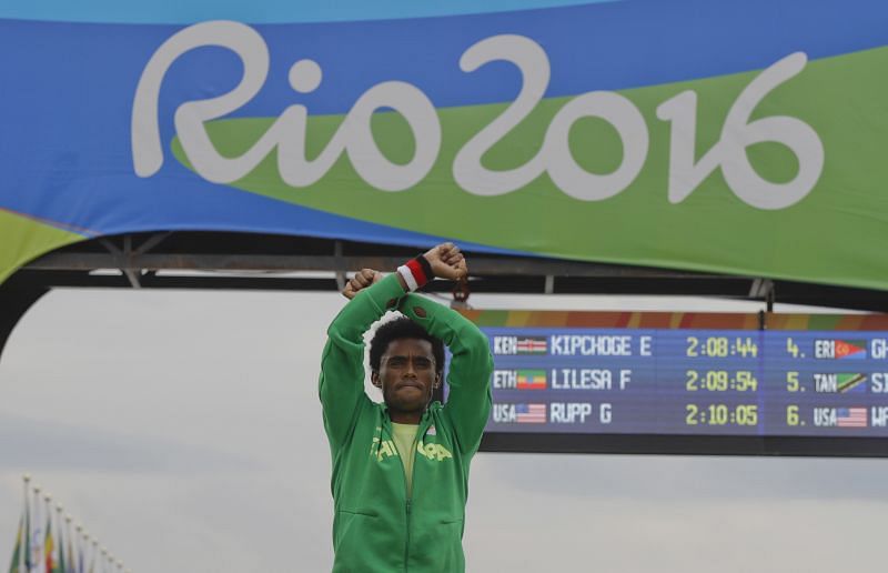 Ethiopian runner who protested at Olympics invited home Ethiopian runner who protested at Olympics invited home