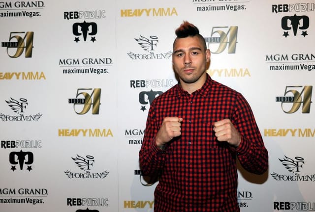 When did UFC commentator Dan Hardy retire from fighting and why?