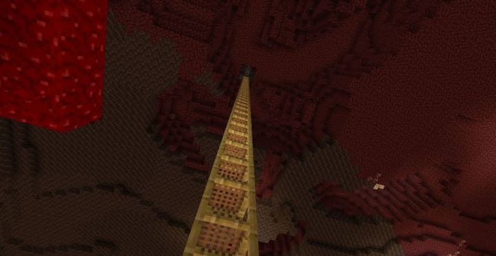 An Easy Guide: How to get on top of the Nether ceiling in Minecraft?