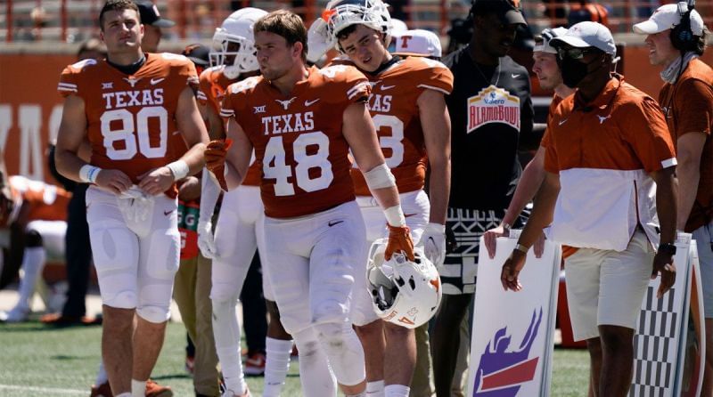 Why did Jake Ehlinger spend his college career with brother Sam at Texas?