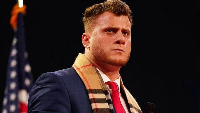 Why does MJF wear a scarf?