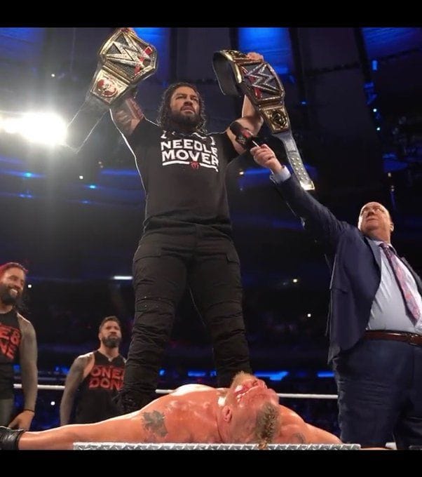 Photo: Roman Reigns shows off Brock Lesnar's blood on his arm after ...