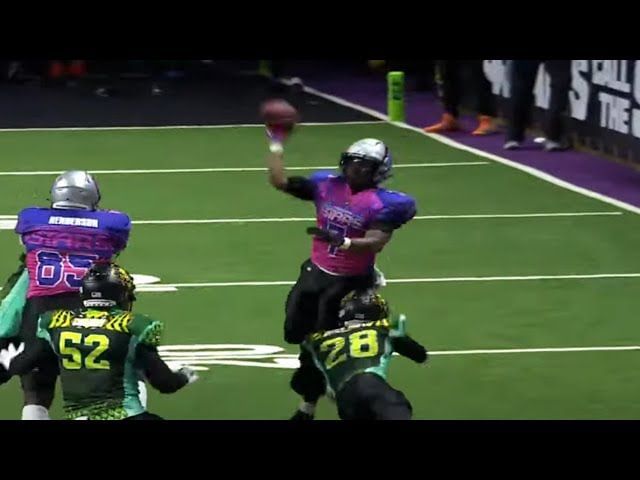 Quarterback pulls off a dime while being flipped over during Fan ...