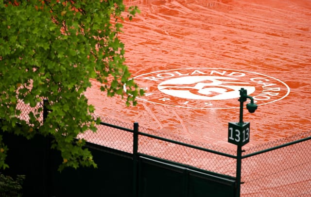 Why is French Open played on clay? Was it ever played on grass?