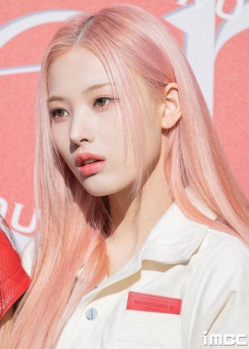 Netizens angry after discovering edited red carpet photos of NMIXX