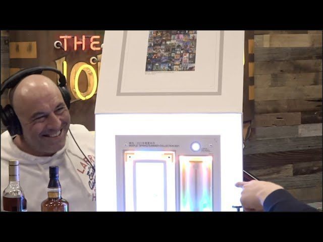 Watch: Joe Rogan gifted Elon Musk NFT created by JRE guest Beeple