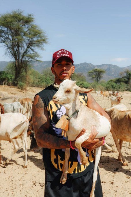 "One picture. Two GOATS"- Fans react to Lewis Hamilton's picture with a ...