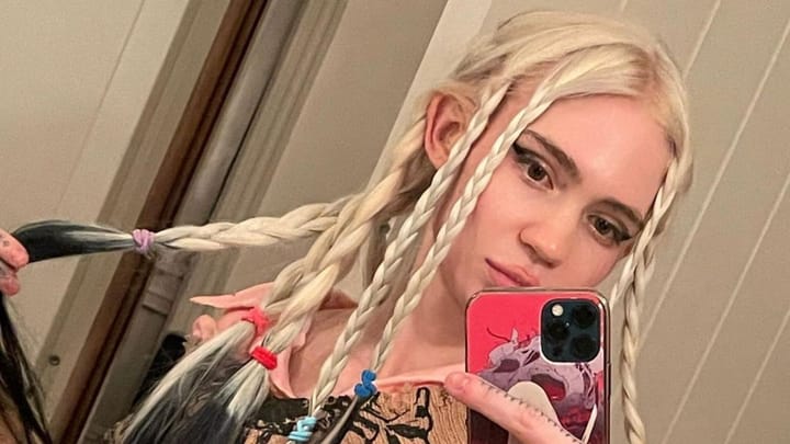 What did Grimes do to her face? Before and after pictures go viral as ...