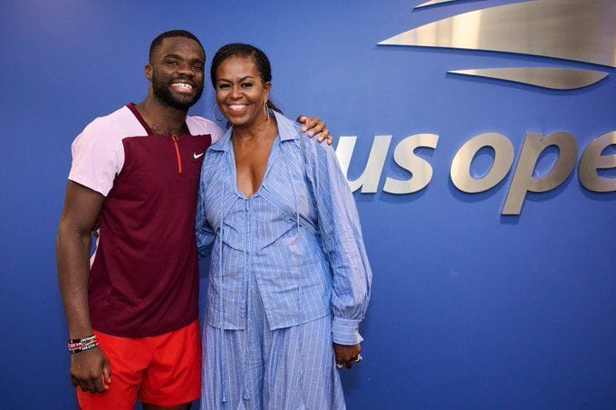 Frances Tiafoe poses with girlfriend at Vogue World Runway event