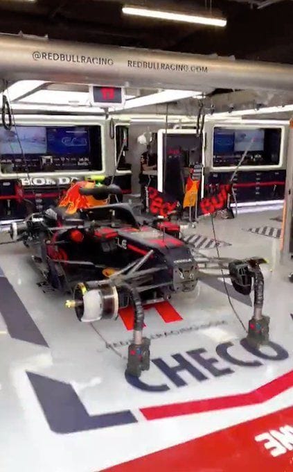 Why do F1 drivers drink from a long straw after a race?