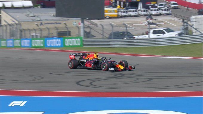 Why do F1 drivers drink from a long straw after a race?