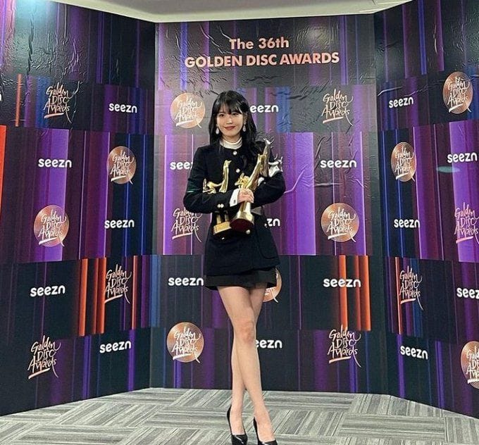 IU fans rejoice as the singer wins the Rookie Female Actress award at ...