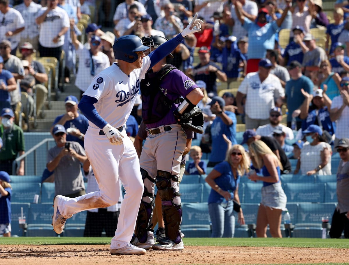 U.S. Coast Guard veteran and die-hard Dodgers fan Travis Evans ringed in his 100th birthday ...
