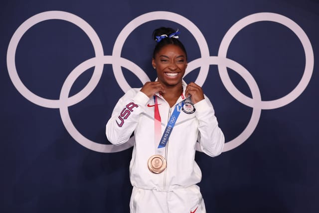"The cutest lil baby" - Simone Biles welcomes newest member of her family
