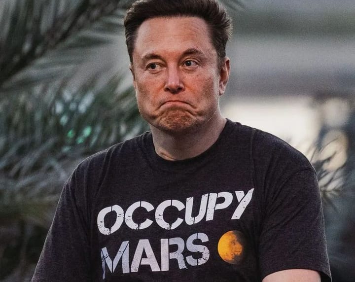 How tall is Elon Musk?