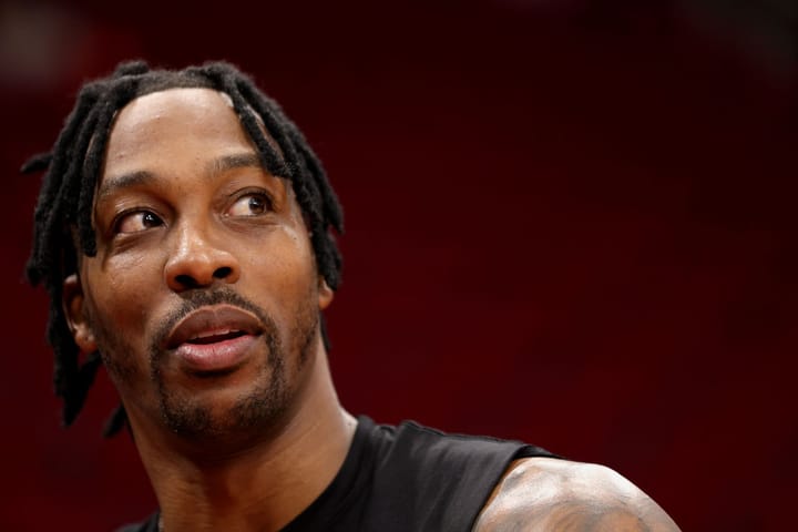 Watch: Dwight Howard cringes after a barber almost cuts his dreads: "I ...