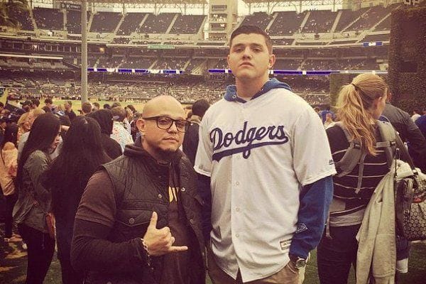 What does WWE star Rey Mysterio's face look like without his mask?