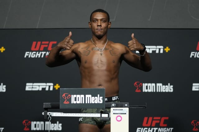 What is Jamahal Hill's UFC record?