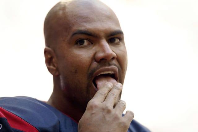 Why do football players lick their hands? Weird QB practice explained