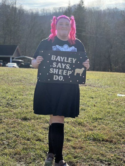 Bayley tears up a WWE fan's poster; sends four-word 'insult' afterward ...