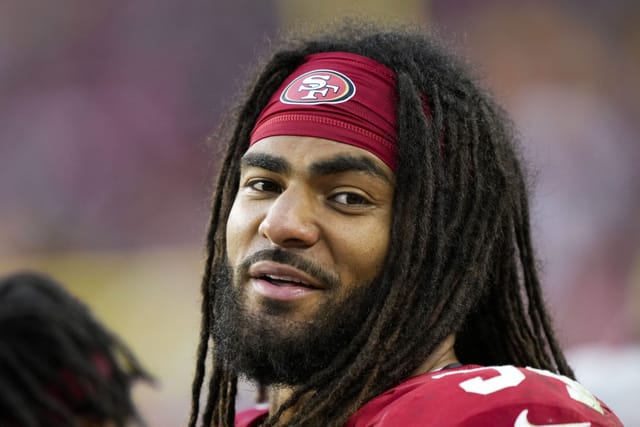 Who are Fred Warner's parents, Laura and Fred Warner Sr.?