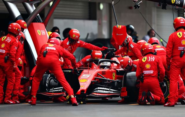 How much does an F1 pit crew member earn?