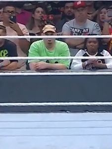 Green shirt guy in WWE - Superfan Smilez: Who is the 'green shirt guy ...