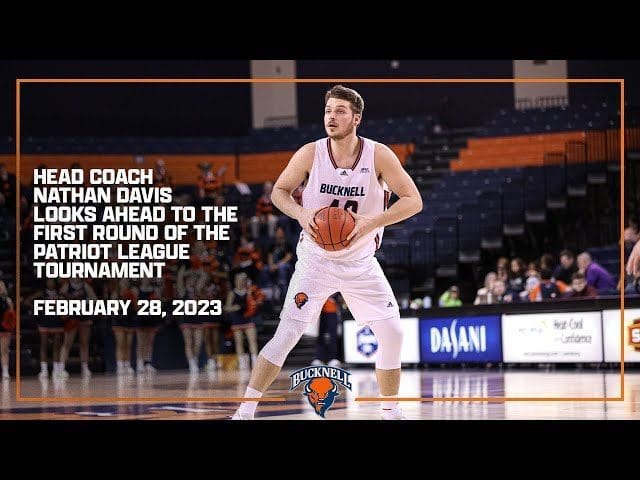 Who is Nathan Davis, and what was his coaching record with Bucknell Bison?