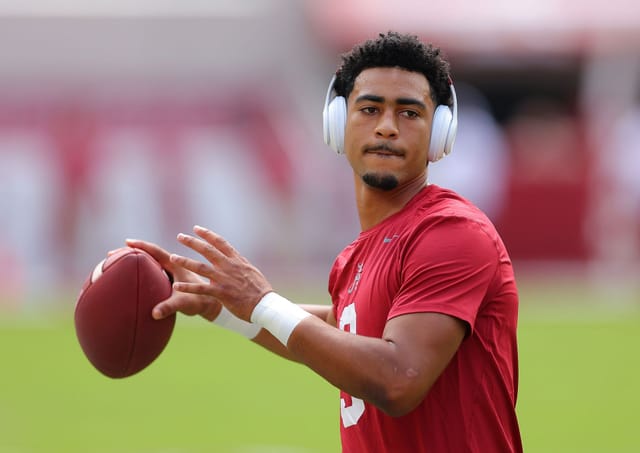 How tall is Bryce Young? Mina Kimes posing next to life-sized cutout of ...