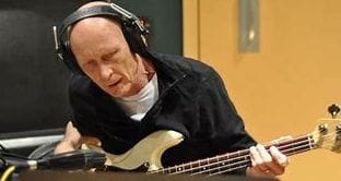 Who was Michael Rhodes? Tributes pour in as bass player dies aged 69