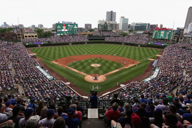 MLB fans in splits as dumpster at Chicago Cubs' home stadium catches ...