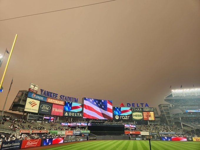 New York Yankees fans react to smoke from Canadian wildfires shrouding ...