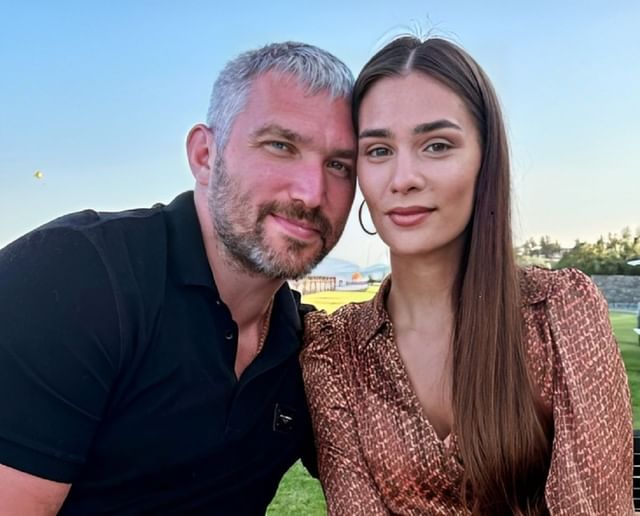 Alexander Ovechkin and wife Anastasia pose for a picture as son turns photographer