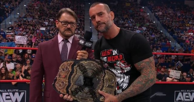 CM Punk: CM Punk must lose the 'real' AEW world title to a legendary ...