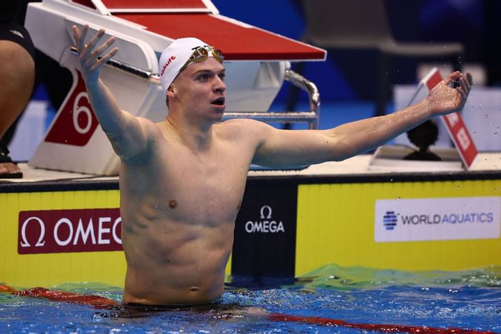 WATCH: Michael Phelps gives Leon Marchand a standing ovation after Frenchman breaks 400m IM WR