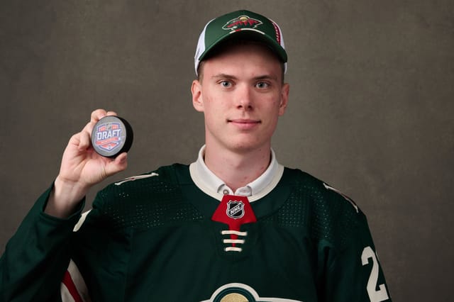 Minnesota Wild prospect Danila Yurov brushes shoulders with two former ...