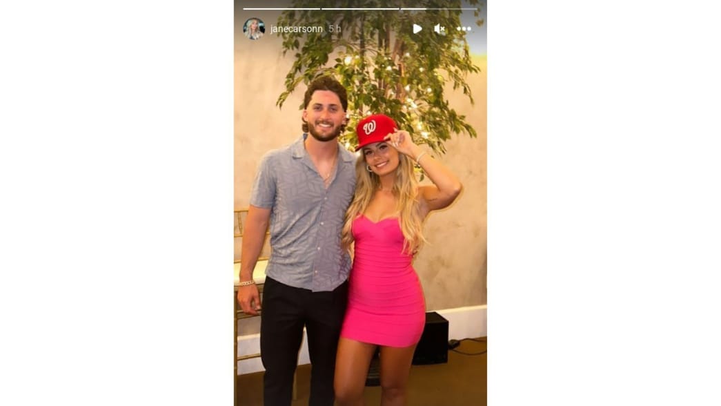 PHOTO: Dylan Crews' GF, Jane, dons a Nationals Cap to celebrate his ...