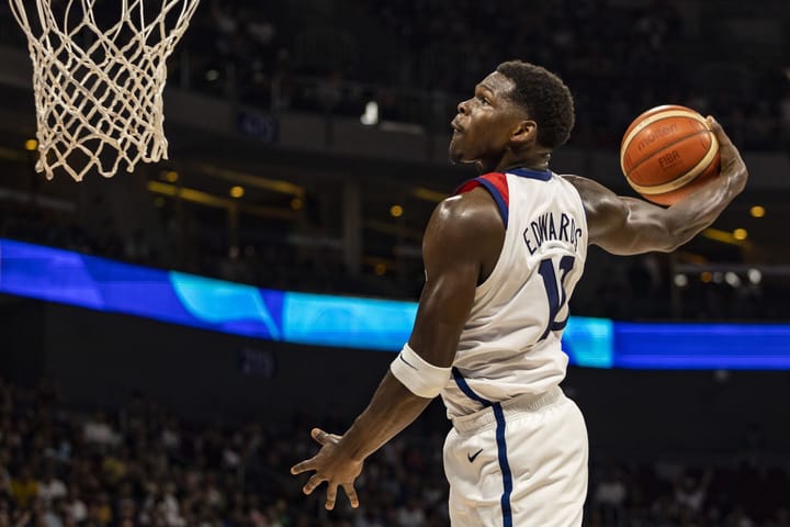 Why is Anthony Edwards changing his jersey number from 1 to 5 next season?