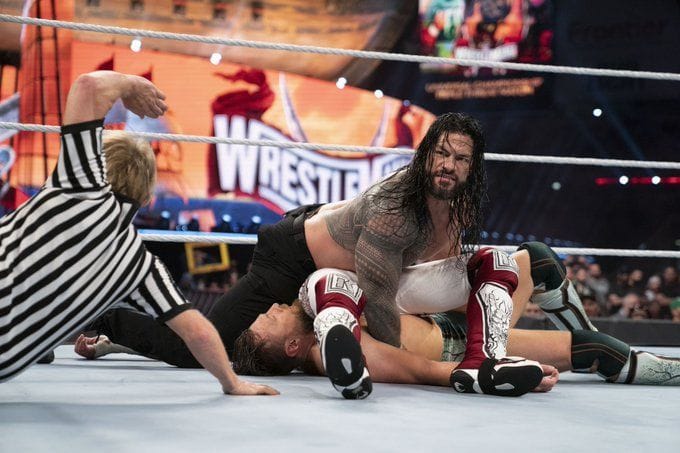 Roman Reigns sends three-word message ahead of Tribal Combat match at ...