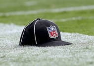 Why do refs throw their hats?