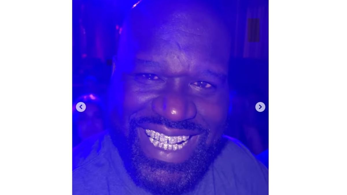 Shaquille O'Neal flashes dazzling diamond teeth at iconic Encore Club in Vegas as son Myles ...