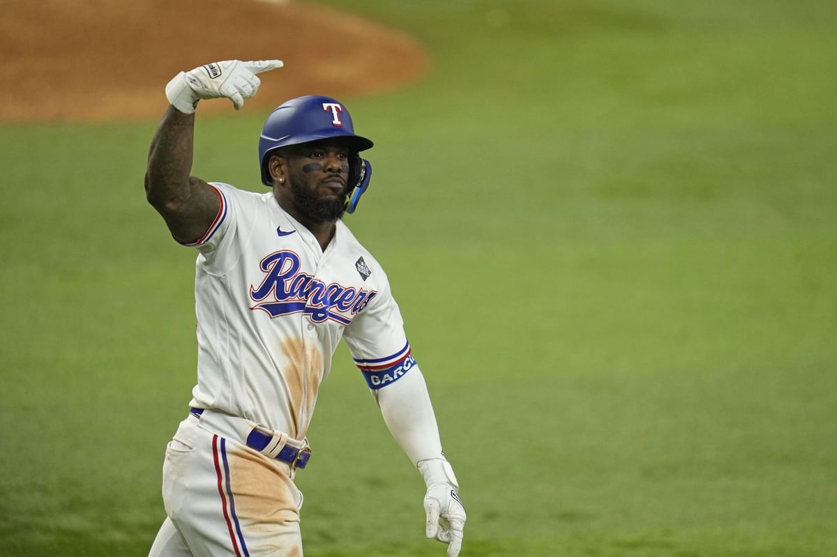 What happened to Adolis Garcia? Rangers star forced to exit World ...