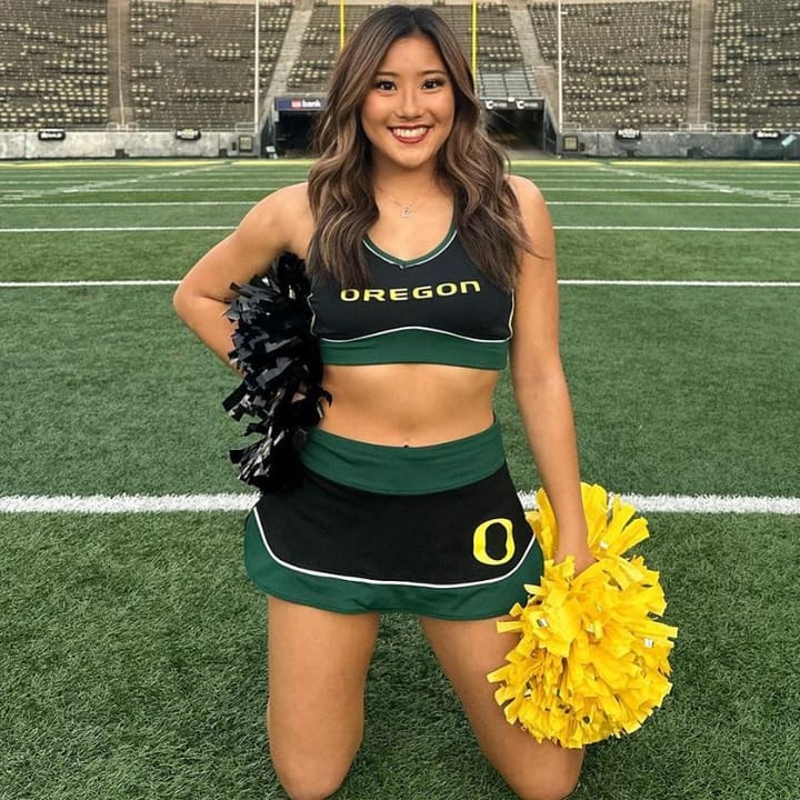 Oregon football cheerleaders walk down memory lane, showcasing Ducks ...
