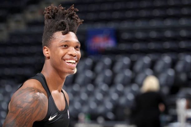 What is the story behind Lonnie Walker's haircut?