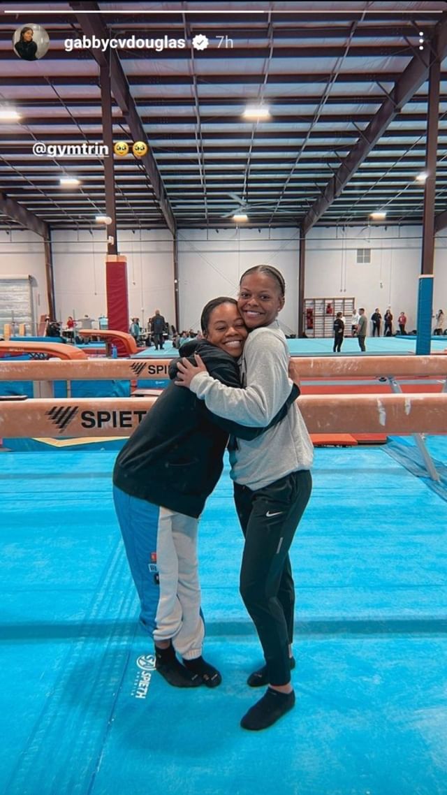 Gabby Douglas spends time with Trinity Thomas during Gymnastics ...