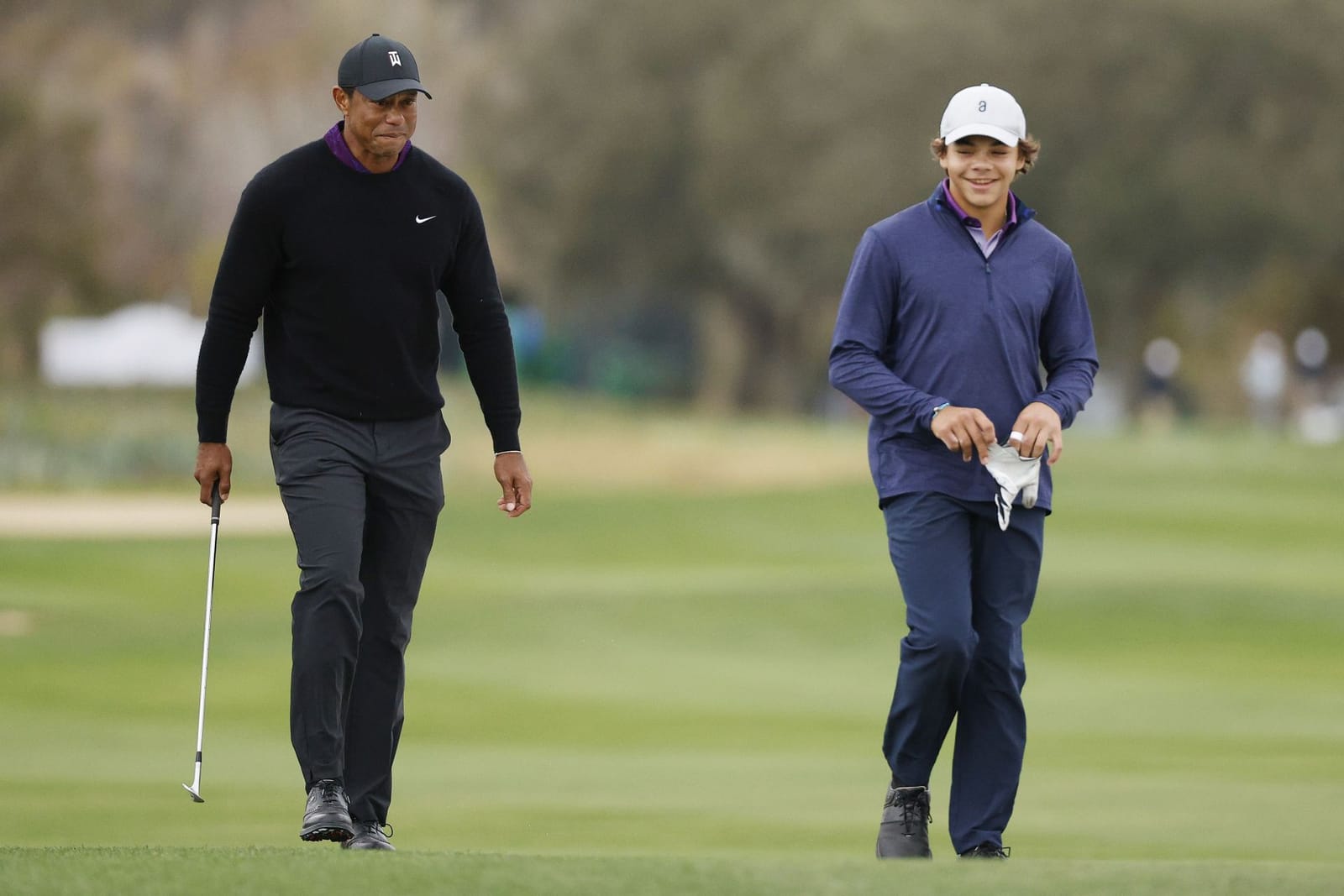 Watch: Tiger Woods’ daughter Sam makes her caddie debut at PNC Championship