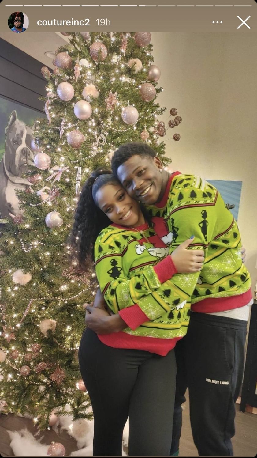 Anthony Edwards and girlfriend Jeanine Robel twin in festive sweaters ...