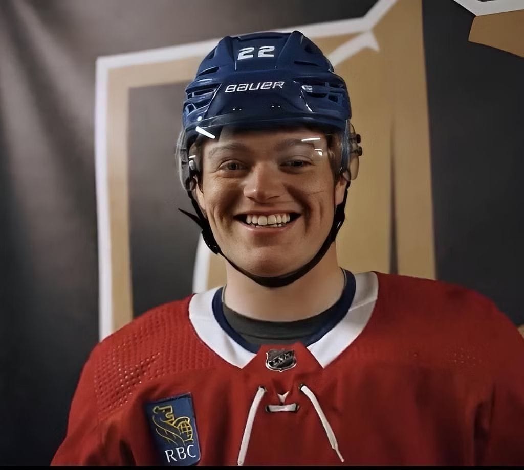 How old is Cole Caufield?