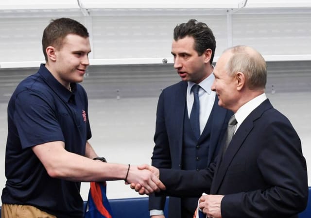 Hurricanes' Alexander Nikishin meets with Vladimir Putin as NHL fans ...