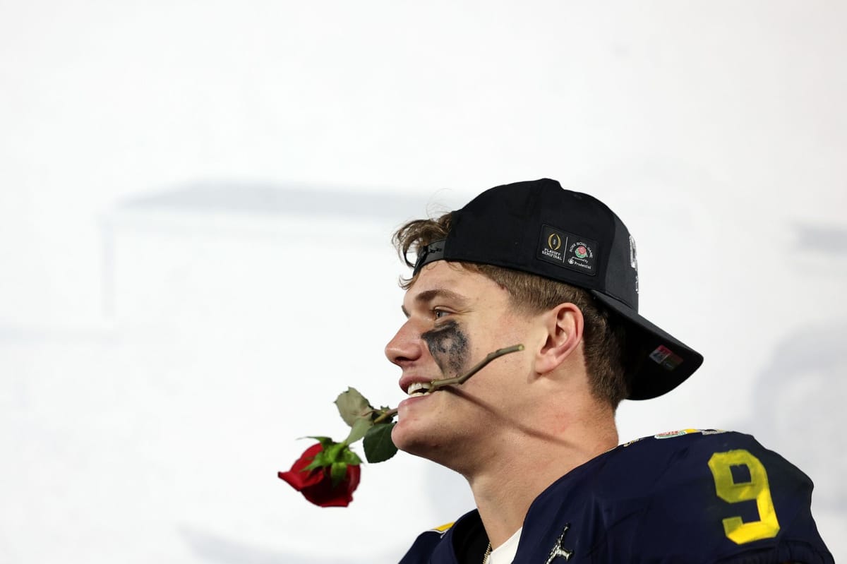 Why does JJ McCarthy wear a smiley face on his hand?